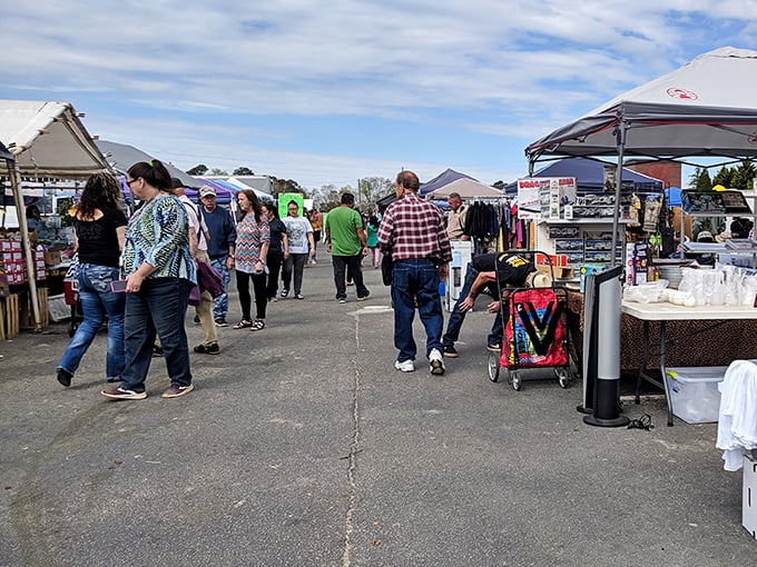 Shoppers browse outdoor stalls at Peachtree Peddlers, where weekend treasure hunting becomes a social event.