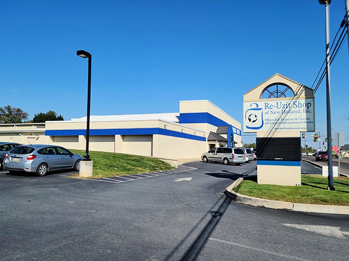 Re-Uzit exterior: "Clean lines and blue trim signal this isn't your grandmother's cluttered thrift store—though her furniture might be inside!"