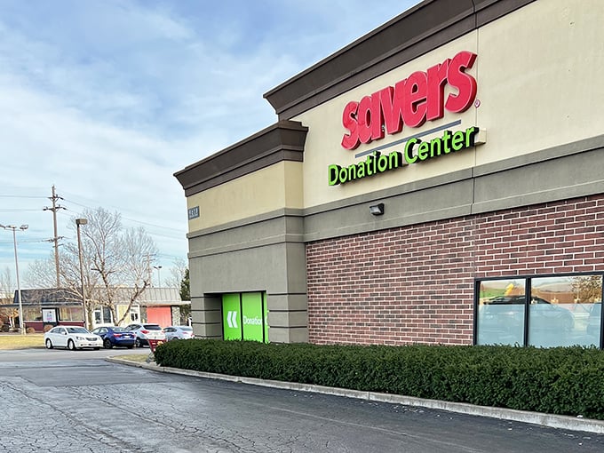 Savers' distinctive red signage pops against the neutral building. This donation center is the first step in the magical transformation of castoffs to treasures.