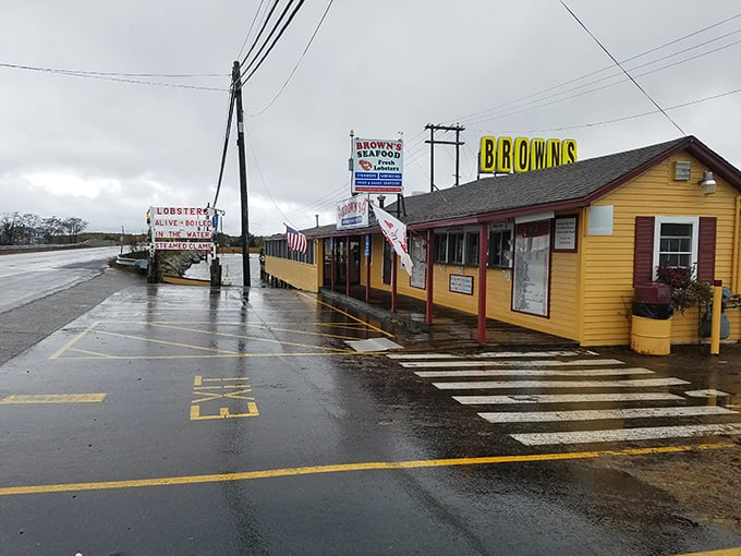 Rain-slicked pavement leads to Brown's – where even stormy days can't keep the faithful from their lobster fix.