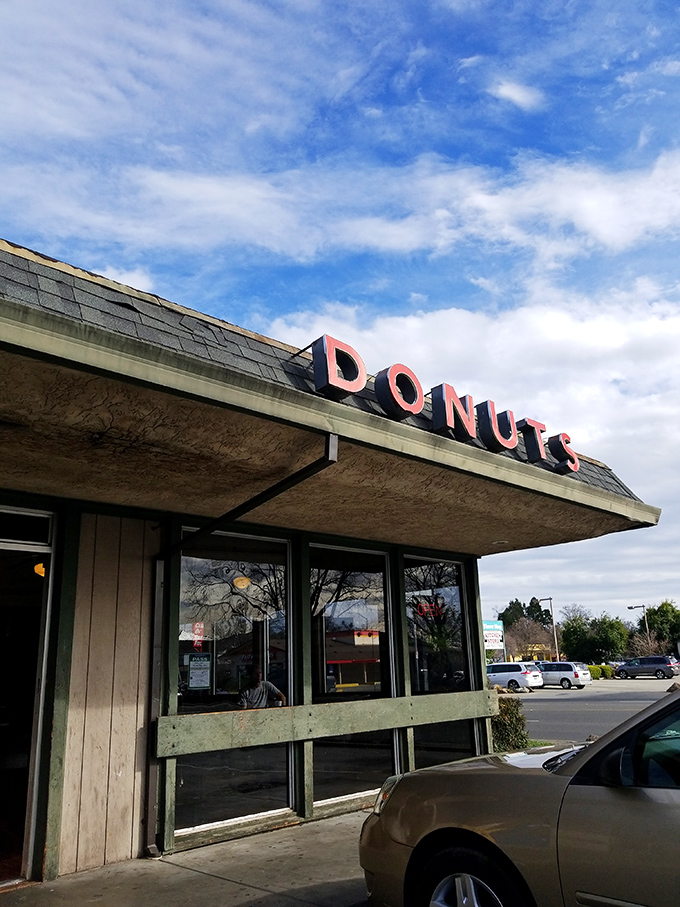 Simple green trim, big pink letters, and donuts that'll make you forget your name. Chico's sweetest tradition.