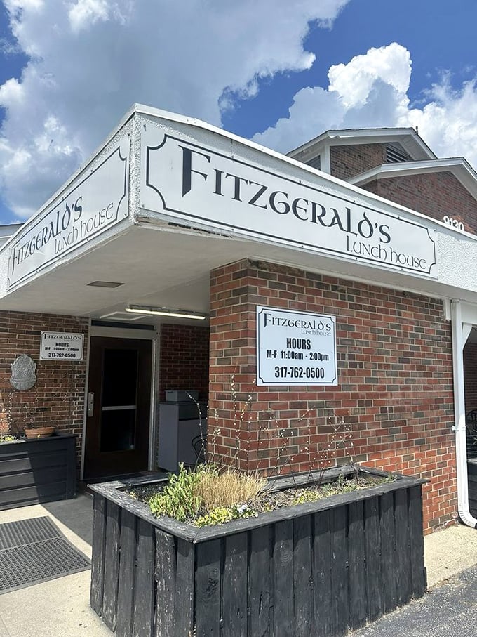 Old-school cool! Fitzgerald's classic lunch house sign and brick facade promise a no-nonsense sandwich experience that focuses on flavor rather than frills.