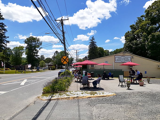 This casual roadside eatery with pink umbrellas proves that great Connecticut experiences don't require fancy settings, just good company and local flavor.