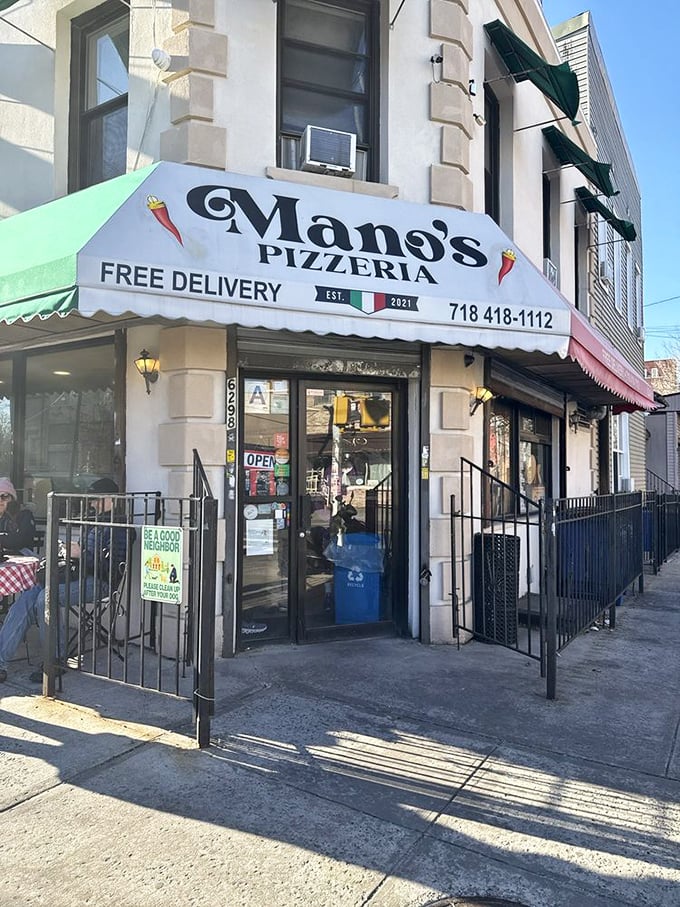 This green-awninged gem proves that great pizza transcends all borders, linguistic and geographic alike.