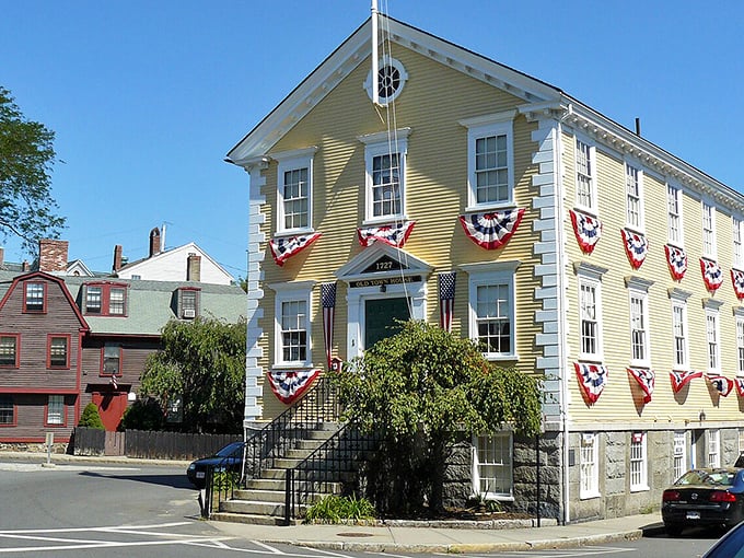 The yellow building stands proud among Marblehead's historic structures. Colonial charm with a splash of sunshine that says "welcome home."