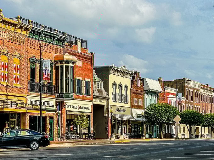 These storefronts wear their Dutch heritage like Sunday best – complete with stepped gables and all.