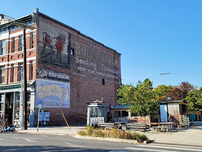 Vintage murals whisper tales of simpler times when tobacco and community spirit filled every corner.