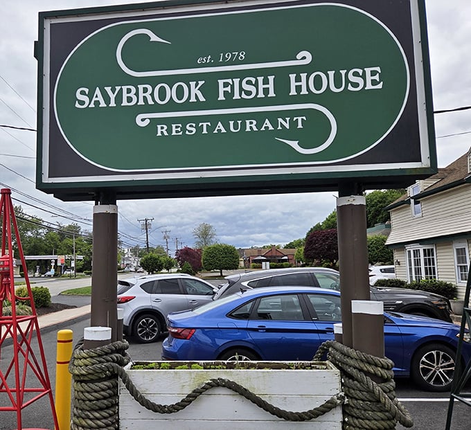 This bold green sign points the way to Saybrook Fish House, proving you don’t need to be on the shoreline to reel in great seafood.