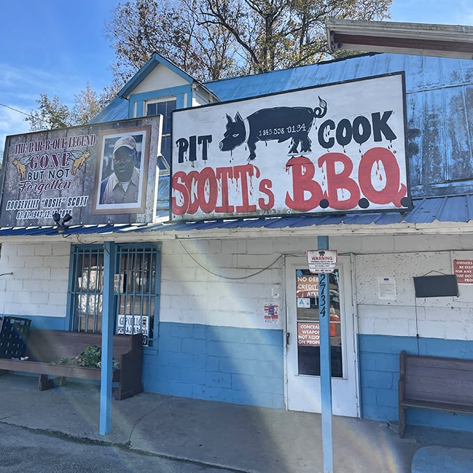 That "PIT COOK" sign isn't just decoration – it's a promise of authentic wood-cooked barbecue magic.