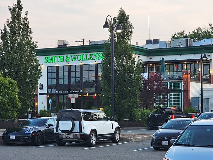 The unmistakable green sign of Smith & Wollensky shines like a beacon for steak lovers—proof that serious steak business is happening inside.