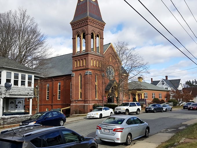 Colorful buildings line Southbridge's Main Street, a rainbow of affordability in Massachusetts' housing landscape.