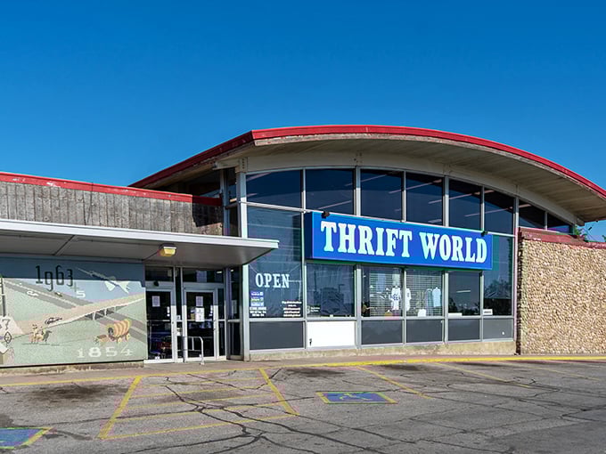The retro-futuristic building design stands out against the blue sky—a landmark for generations of Omaha bargain hunters.