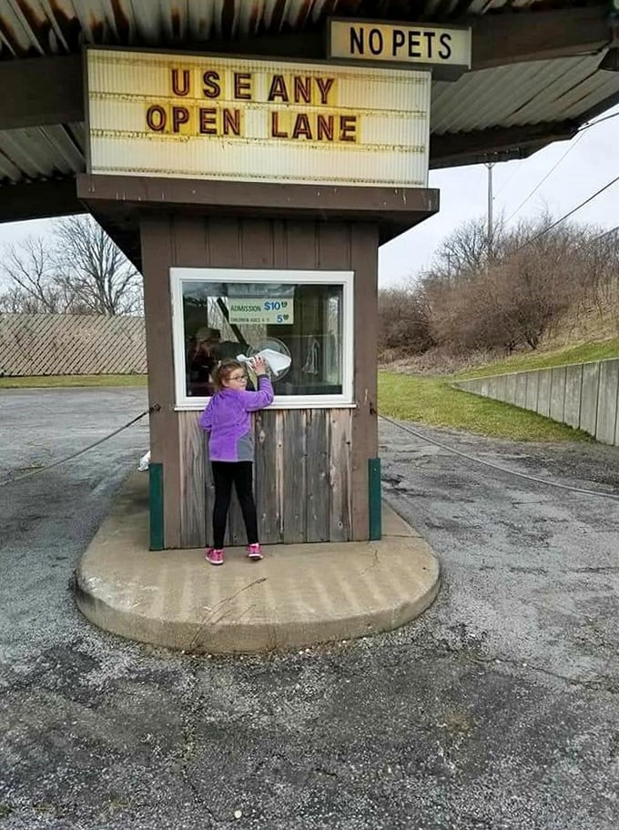 The humble admission booth—where everyday life gets checked at the gate and movie magic receives its modest admission fee.