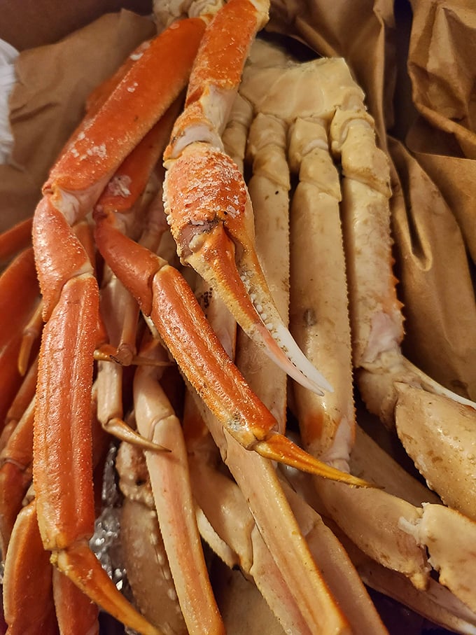 Snow crab legs that make you work for your reward—like nature's version of those fancy puzzle boxes, except infinitely more delicious.