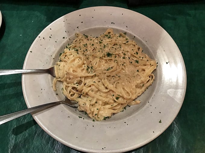 Fettuccine Alfredo so creamy it should come with a warning label. This is comfort food operating at its highest level of comfort.