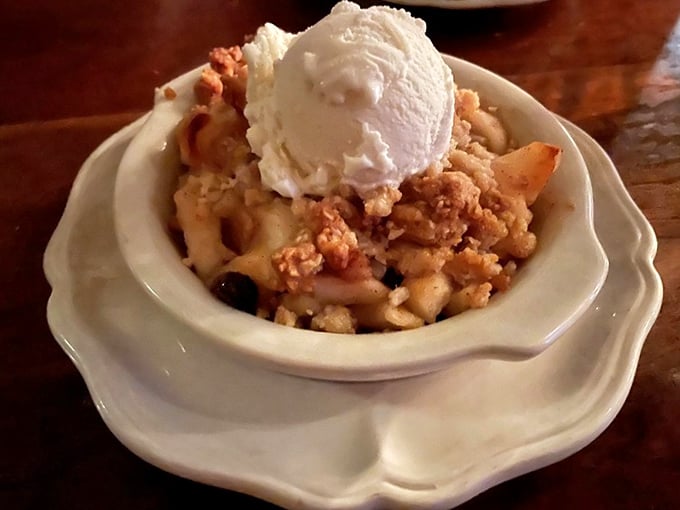 Warm apple crisp topped with ice cream – because some traditions shouldn't be messed with.