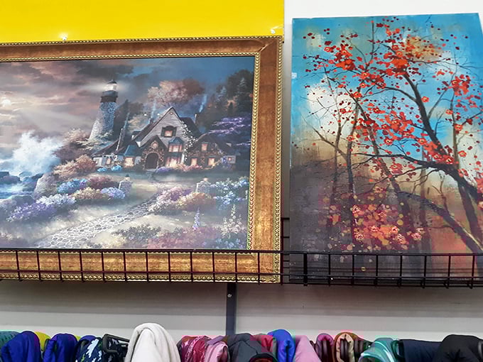 Wall art that spans the taste spectrum from "lighthouse in distress" to "autumn tree having a moment" – someone's future living room statement piece.