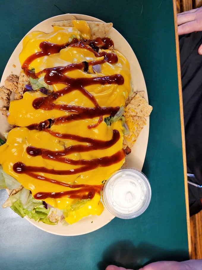 BBQ nachos that look like they were designed by a cheese-obsessed Jackson Pollock—a beautiful mess that you'll happily devour without shame.