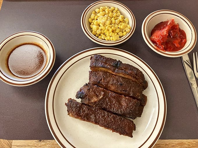 Ribs, corn, and slaw—the holy trinity of Texas BBQ presented with no pretension, just pure deliciousness.