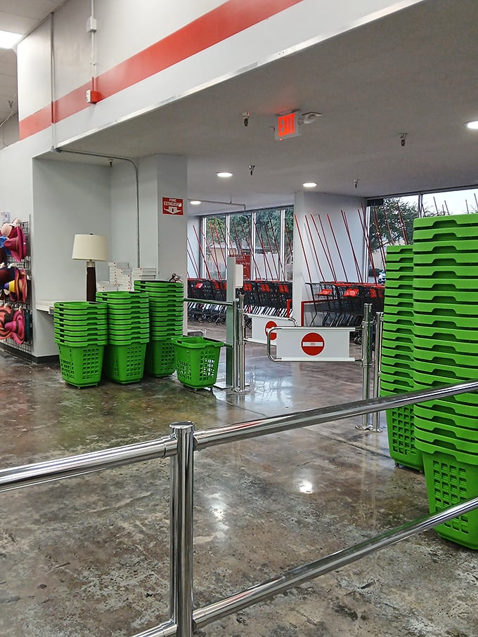 The iconic green shopping baskets stand ready like eager caddies, prepared to help you haul home more treasures than you planned.