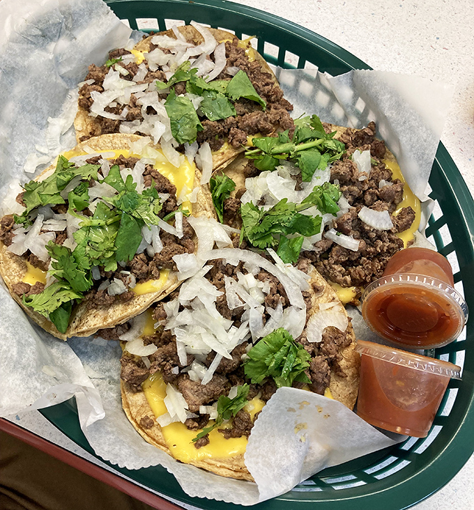 These street tacos don't need fancy garnishes or artisanal tortillas—just properly seasoned beef, fresh onions, cilantro, and the dignity of simplicity.