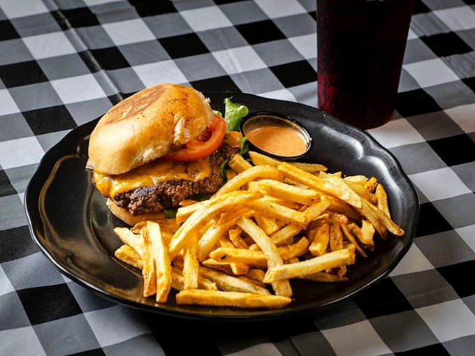 This isn't just a burger—it's a masterclass in how beef should be treated, with crispy fries standing guard on the side.