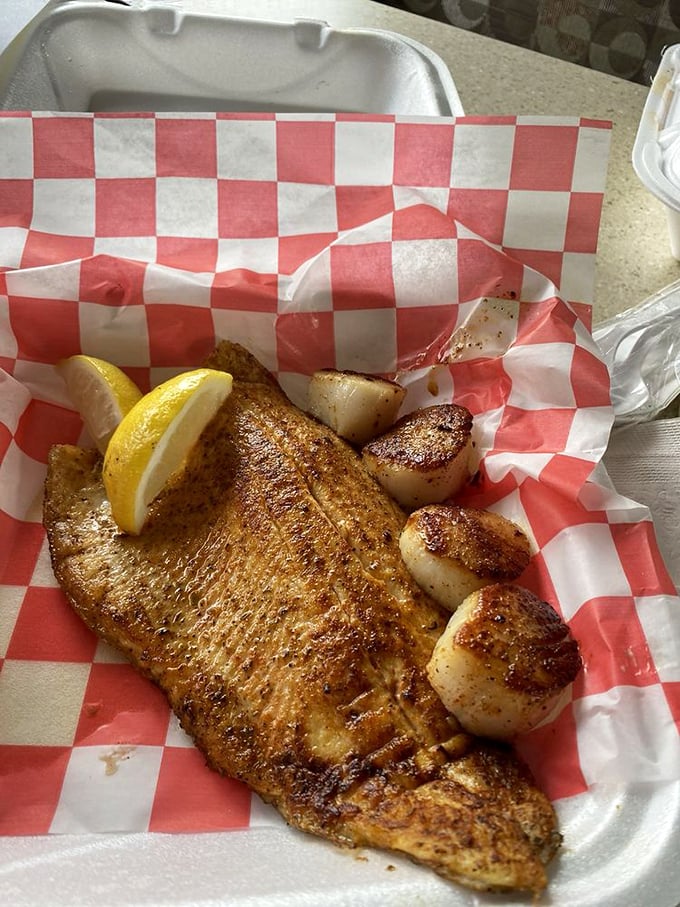 Blackened fish with perfectly seared scallops—proof that sometimes the simplest preparation lets quality ingredients shine. That caramelization is what dreams are made of.