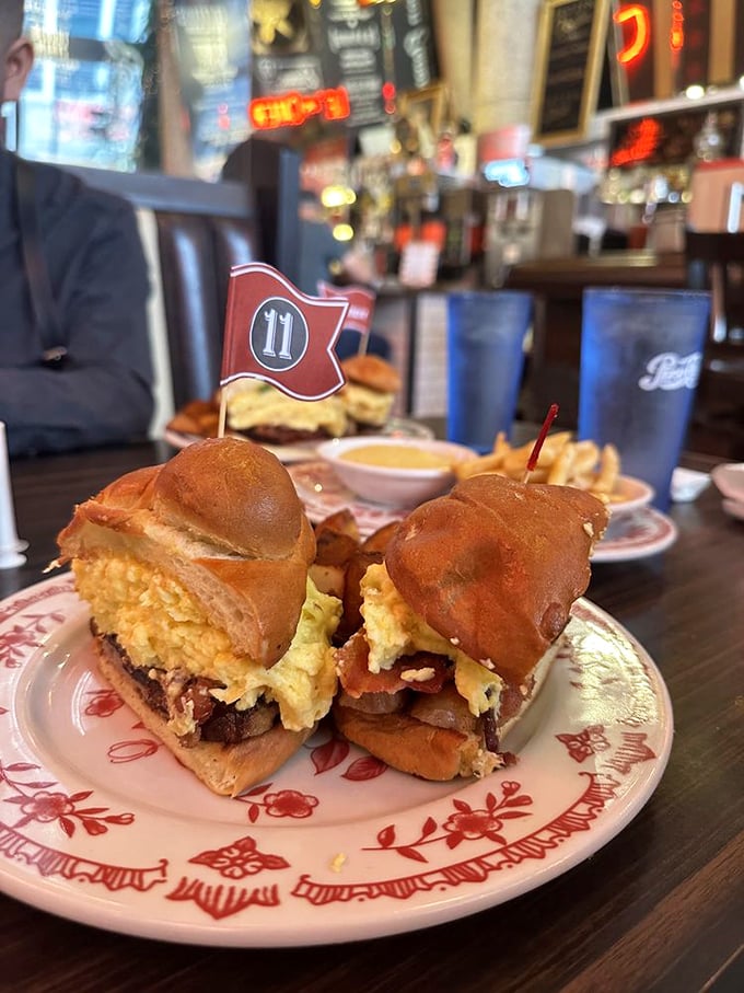 Breakfast sandwiched between pretzel buns with what appears to be egg and meat—proof that good things come to those who brunch.
