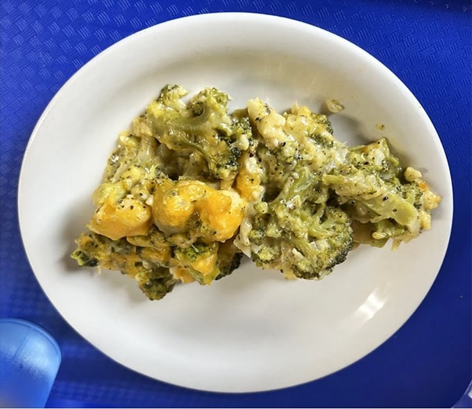 Broccoli cheese casserole that somehow makes vegetables the star of the show—a minor miracle in comfort food mathematics.