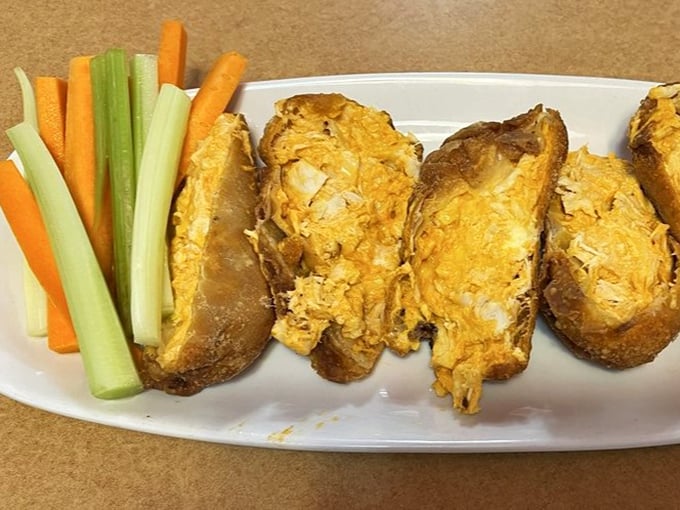 Buffalo chicken eggrolls with crisp vegetables on the side—because sometimes you need something crunchy to justify something fried.