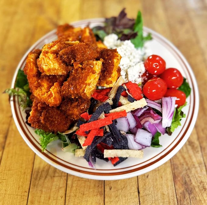A Buffalo chicken salad that solves the eternal dilemma: how to feel virtuous while still enjoying crispy fried chicken and creamy dressing. Genius!