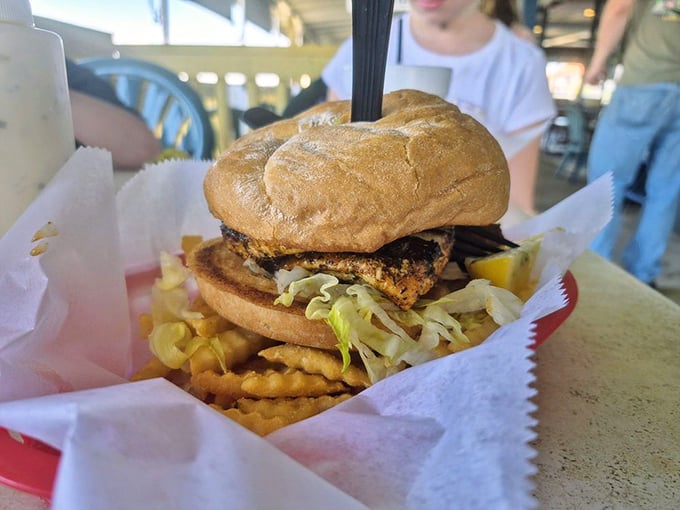 This sandwich doesn't just satisfy hunger – it abolishes it. The kind of burger that demands both hands and several napkins.
