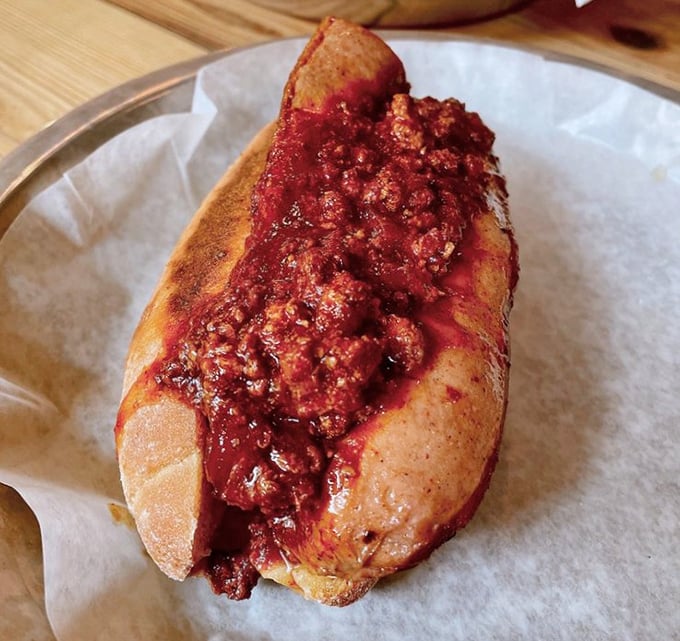 This isn't just a chili dog—it's a handheld flavor bomb that reminds you why certain foods have earned their place in the American culinary hall of fame.