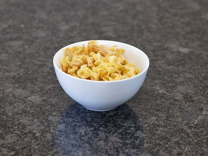 Buttery cabbage and noodles – haluski to those in the know – sitting pretty in a simple white bowl. Humble ingredients, transcendent flavor.