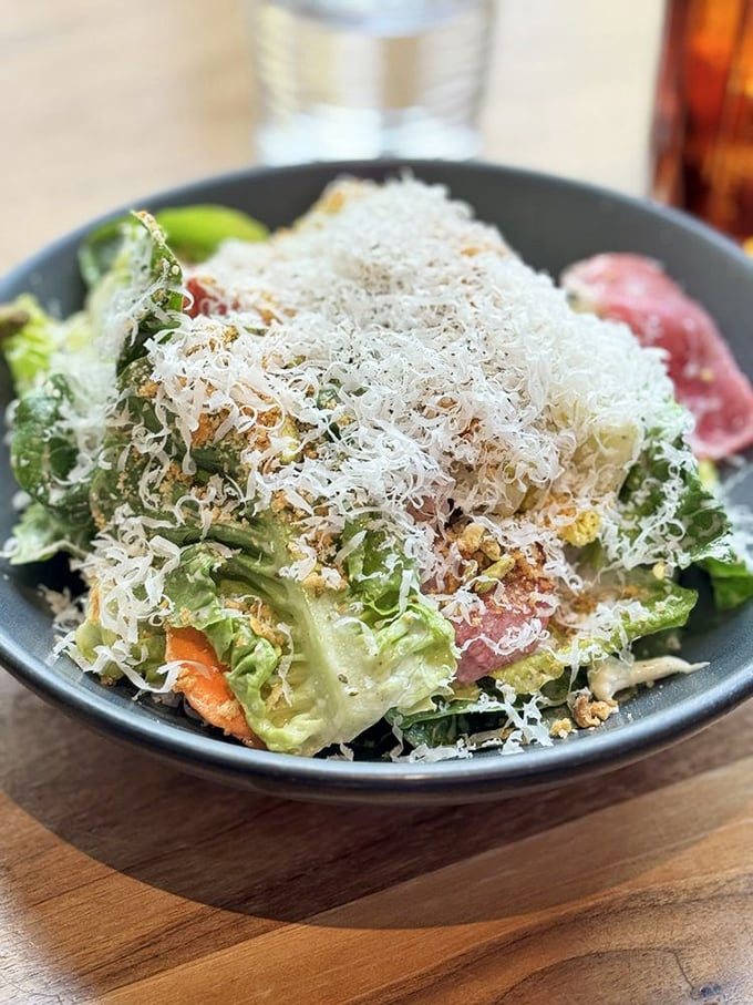 A Caesar salad that Julius himself would cross the Rubicon for. The mountain of cheese doesn't ask for permission—it demands your attention.