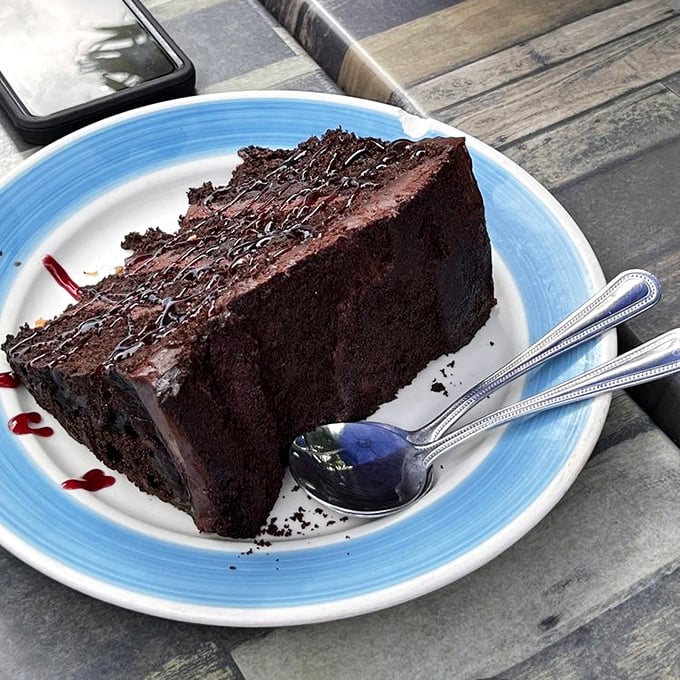 A chocolate cake so dense and rich it should require a warning label. Forget swimming after eating—you might not even walk.