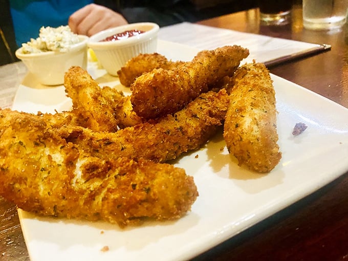 These aren't just calamari strips – they're crispy golden tickets to seafood heaven, where the crunch-to-tenderness ratio is always perfect.