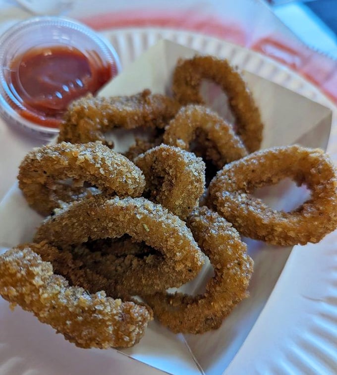 Calamari that's tender, not rubbery – the unicorn of fried seafood. These golden rings deserve their own Olympic medal category.