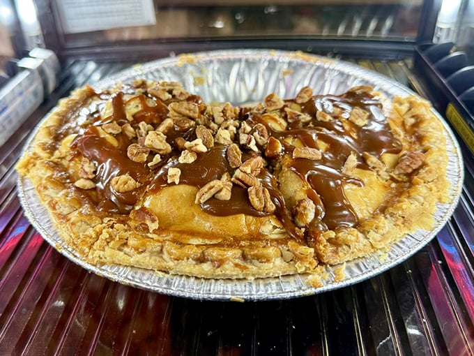 Caramel, apples, and pecans under a golden crust—this isn't just pie, it's Oklahoma's answer to French patisserie.