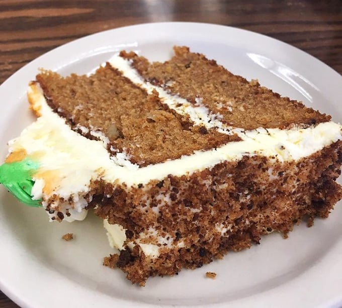Carrot cake that makes you question why anyone bothers counting vegetables in dessert. Each forkful is like a sweet, spiced hug.