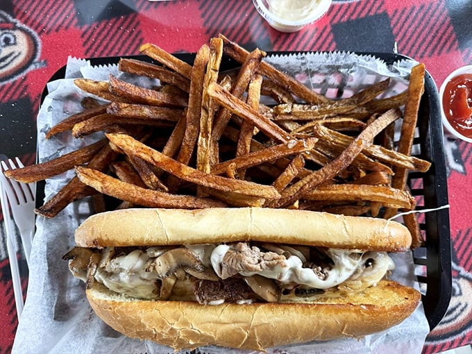 The cheesesteak that launched a thousand napkins. Tender beef swimming in melted cheese—Philadelphia might want to check its rearview mirror.
