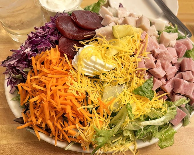 A chef salad that's actually exciting—vibrant, fresh, and arranged with the care of an artist who knows food should feed your eyes first.
