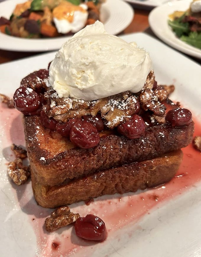 Cherry French toast that transforms bread into dessert without apology. The whipped cream crown makes it breakfast royalty.