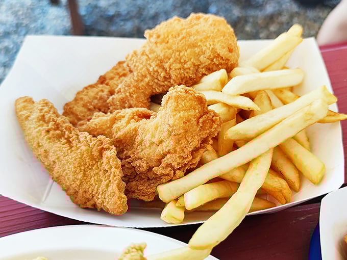 Even the chicken fingers deserve respect – crispy, juicy proof that a seafood joint can nail the landlubber options too.