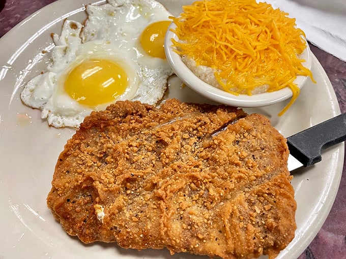 Chicken fried steak that's crispy enough to make you forget your cardiologist's phone number, with cheese grits that could smooth-talk their way onto any plate.