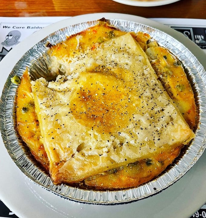 Chicken pot pie that doesn't know it's 2023 – gloriously old-school comfort under a golden pastry roof.