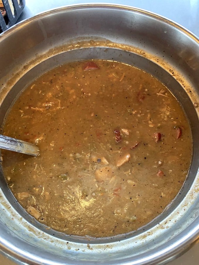 A proper gumbo is worth its weight in gold, and this copper-hued masterpiece delivers with every spoonful of slow-simmered goodness.