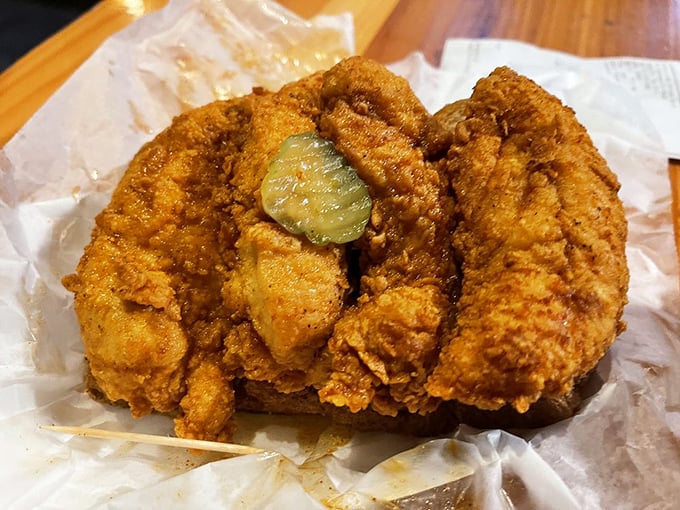 That perfect golden-brown crust with a pickle crown—even the "plain" version outshines most fried chicken in America. Some treasures don't need heat to shine.