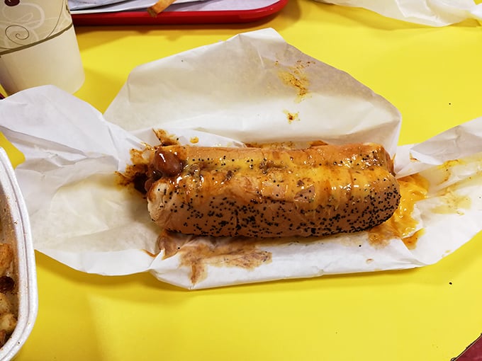 The chili cheese dog—where napkins go to die and dignity is willingly sacrificed for that perfect combination of spice and cheese.