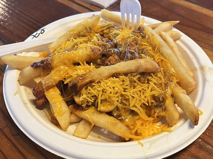 Chili cheese fries that blur the line between side dish and main event—a glorious mess that requires both fork and commitment.